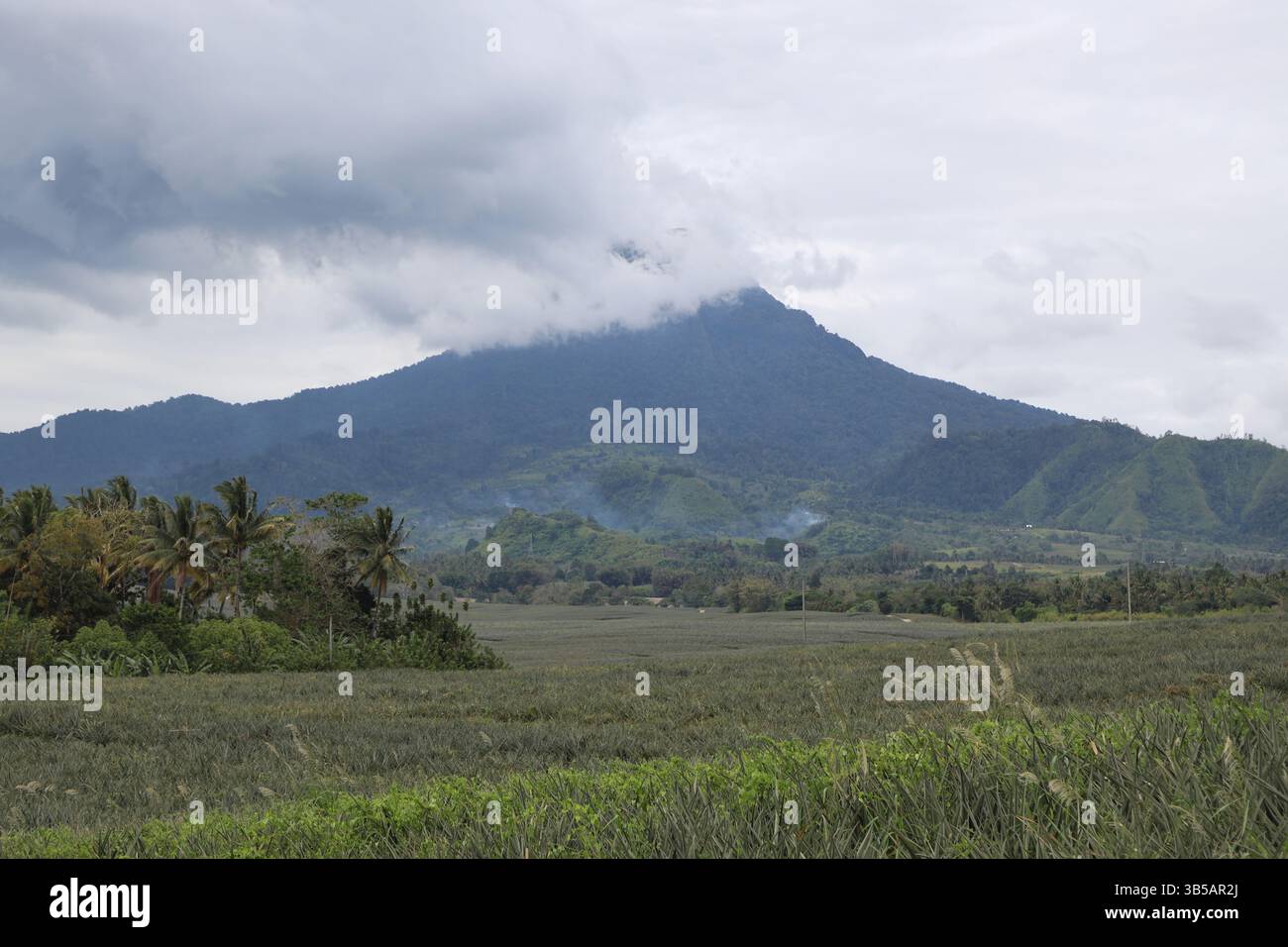 Mount Matutum and clouds in South Cotabato, Philippines Stock Photo - Alamy