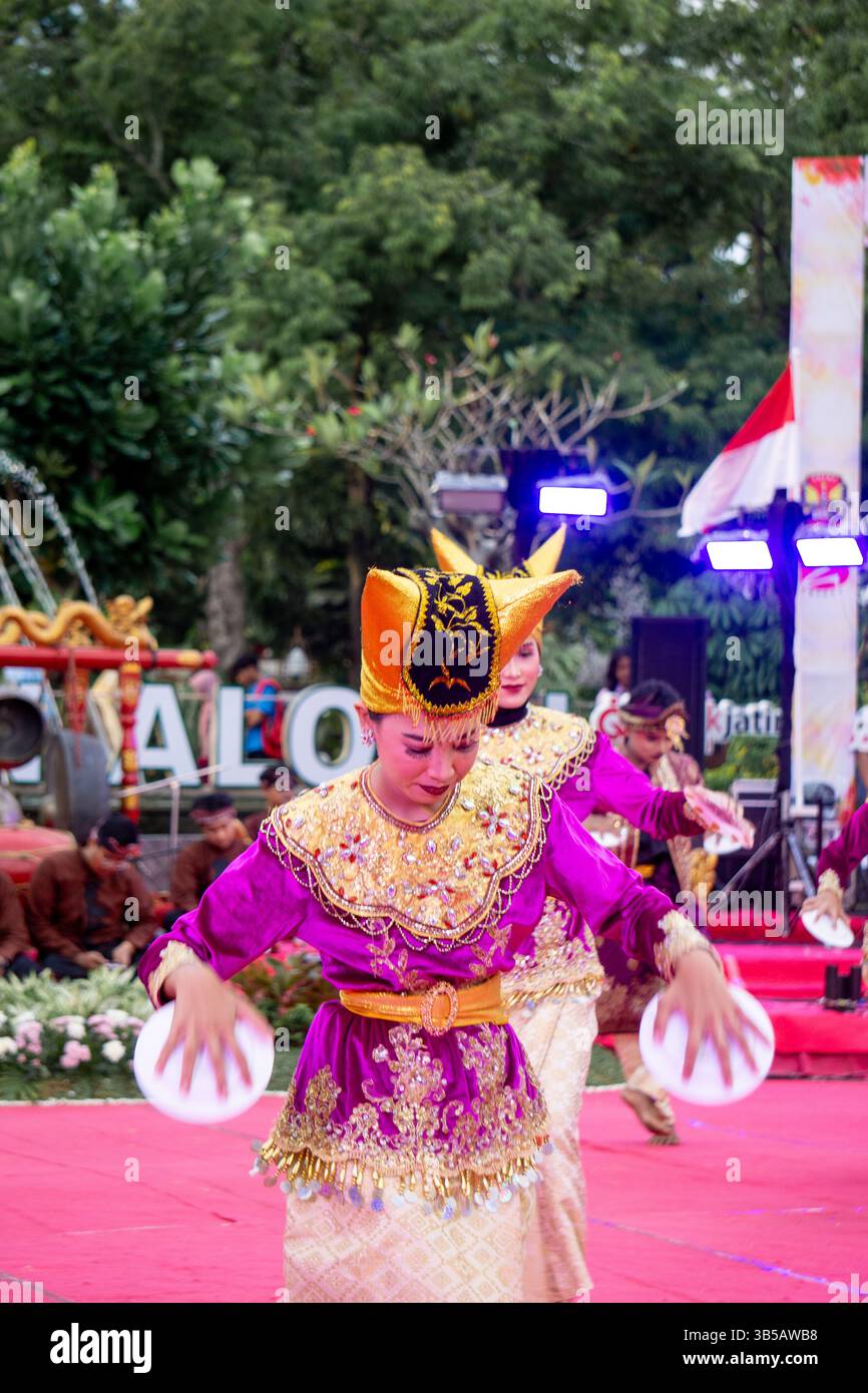 Piring dance (plate dance) from West Sumatra. This dance depicts ...