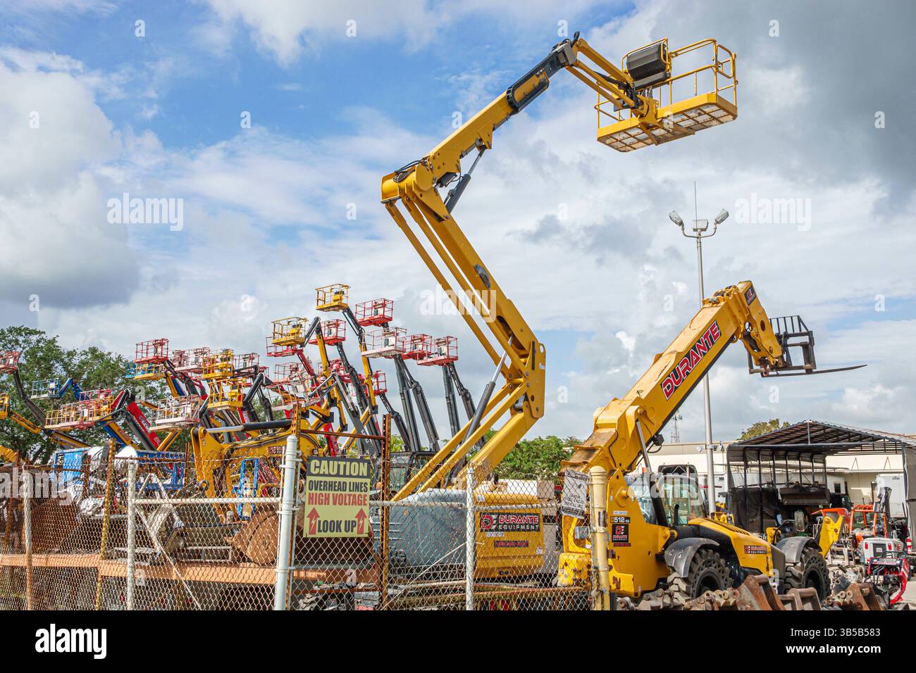 Hollywood Florida,construction rental equipment yard,outdoor lot,boom lifts,aerial work ...
