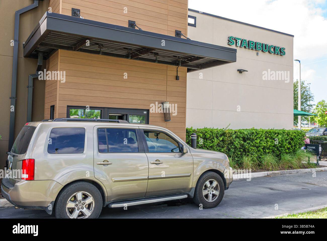 Davenport Florida,Starbucks Coffee,outside exterior drive thru,vehicle ...