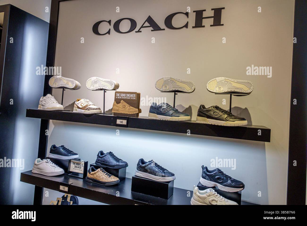 Mens and womens sneakers wall display hi-res stock photography and images - Alamy