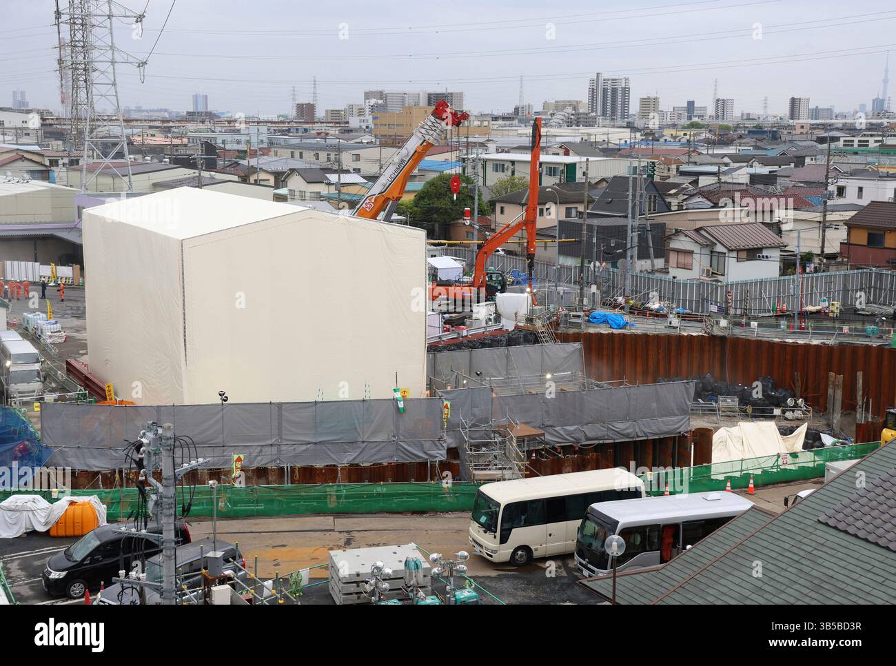 A photo shows the scene of a road collapse where the body of a male ...