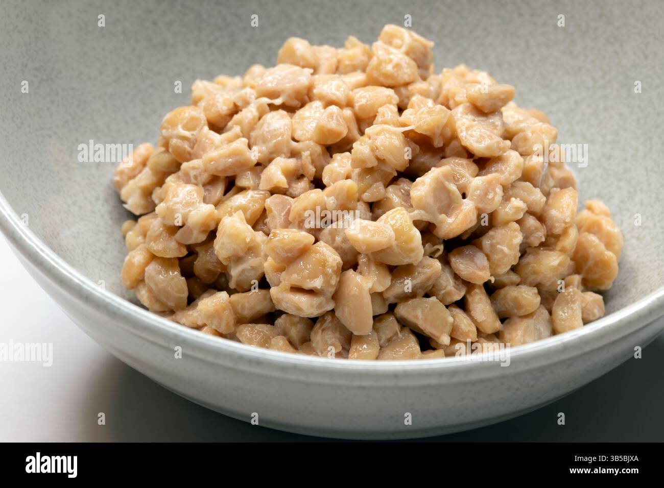 Crushed natto (fermented soybeans) in a bowl Stock Photo - Alamy