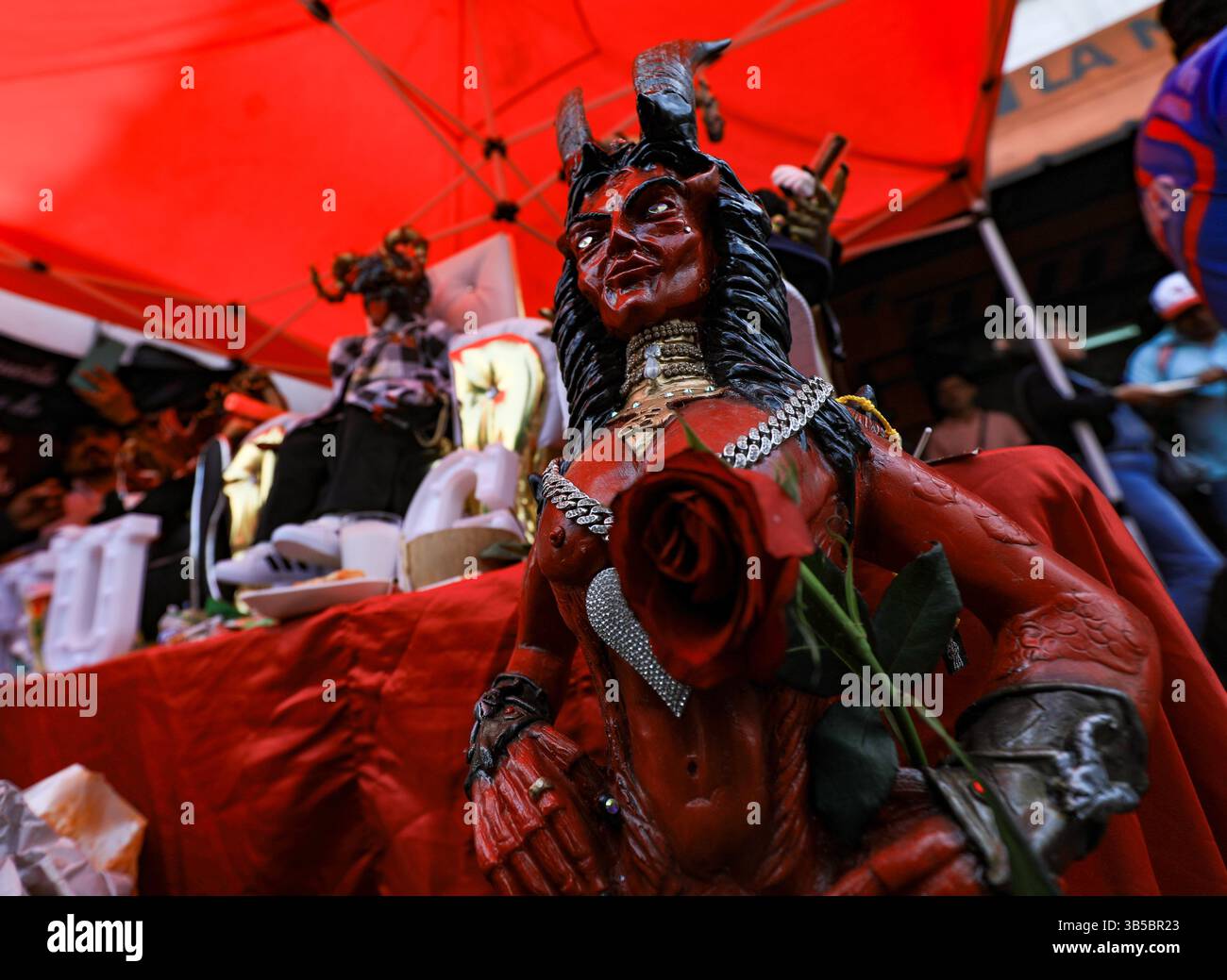 A devil fugure is seen in the rough neighborhood of Tepito of celebrate ...