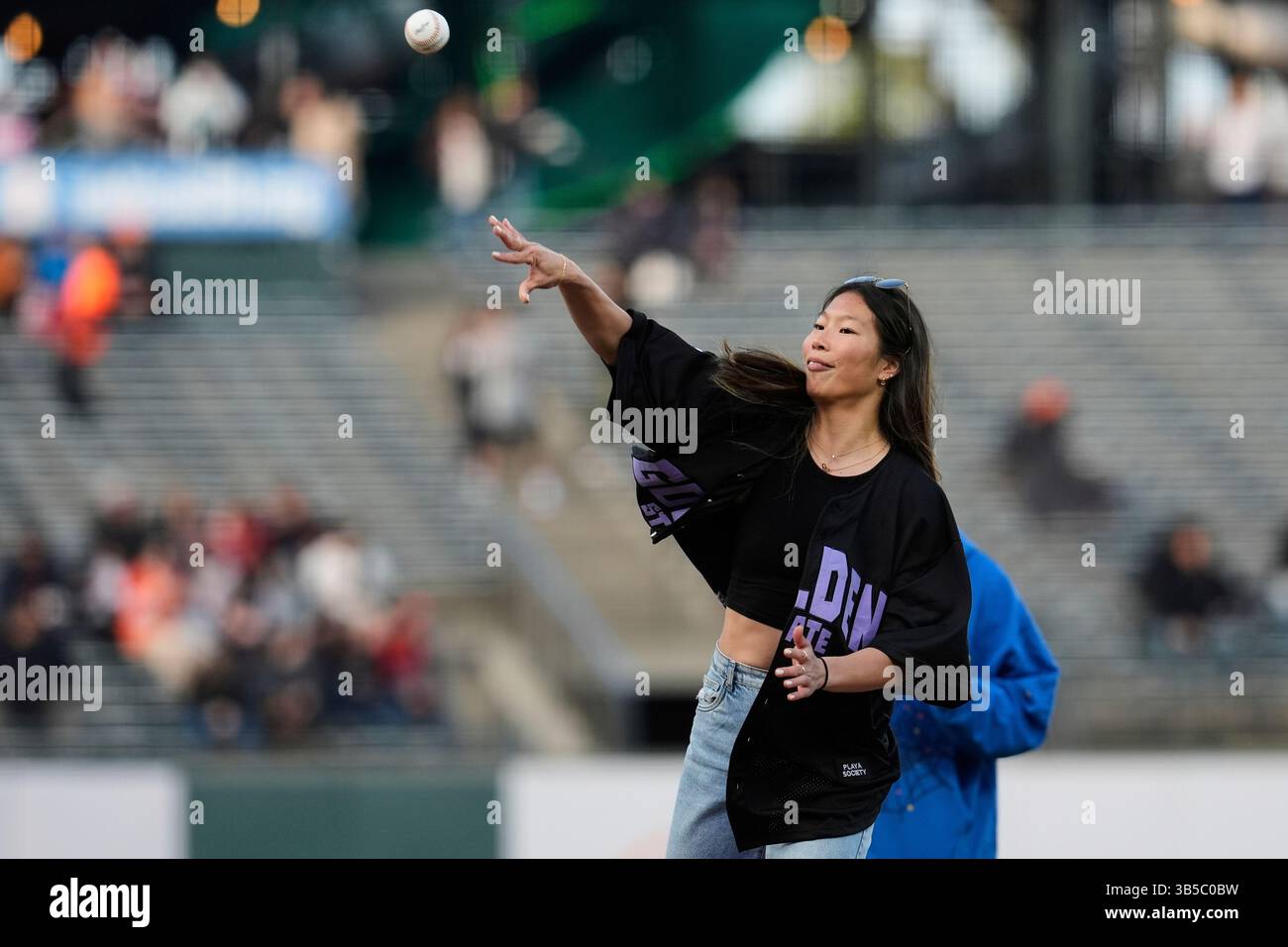 Golden State Valkyries' Kaitlyn Chen throws a ceremonial first pitch ...