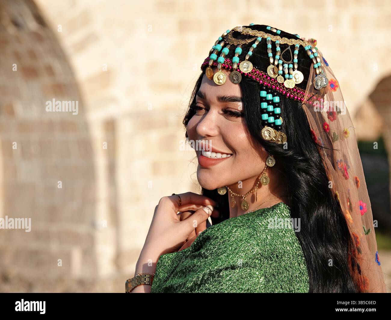 April 29, 2025, Zakho, Iraq: A young Kurdish woman is seen displaying ...