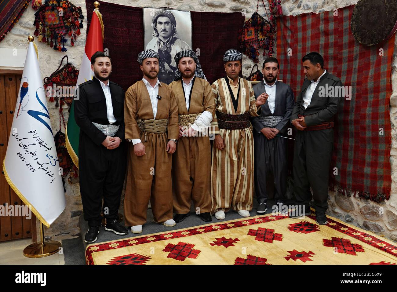 A group is seen displaying traditional Kurdish clothing at the festival ...
