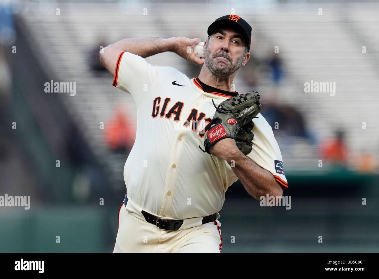 San Francisco Giants pitcher Justin Verlander throws to a Colorado ...