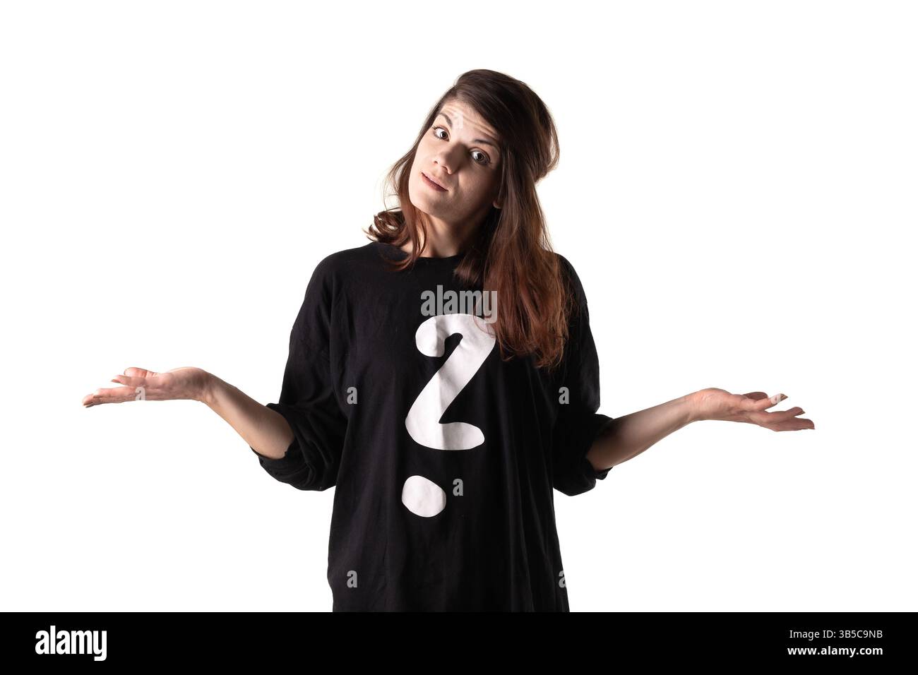 Portrait of a girl wearing black outfit with white question mark making ...