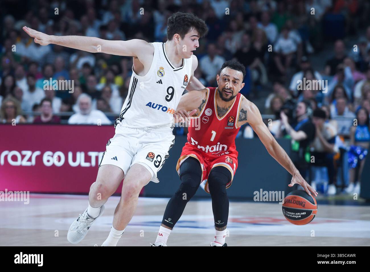 Madrid, Spain. 1st May, 2025. Real Madrid's Hugo Gonzalez (L) vies with ...