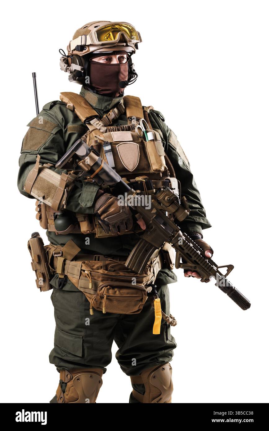 Modern military professional posing with full tactical equipment and ...