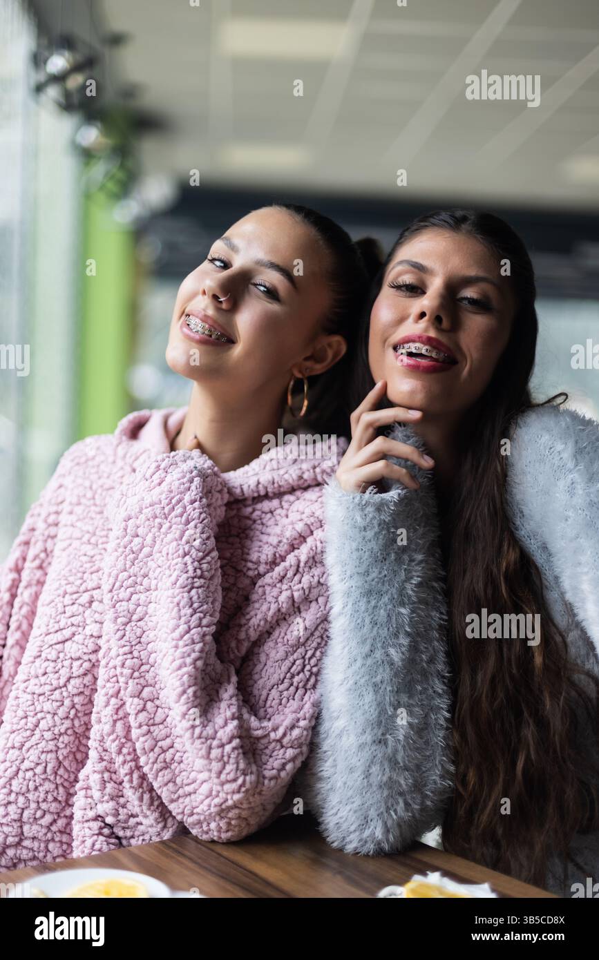 Two women enjoy warm friendly hi-res stock photography and images - Alamy