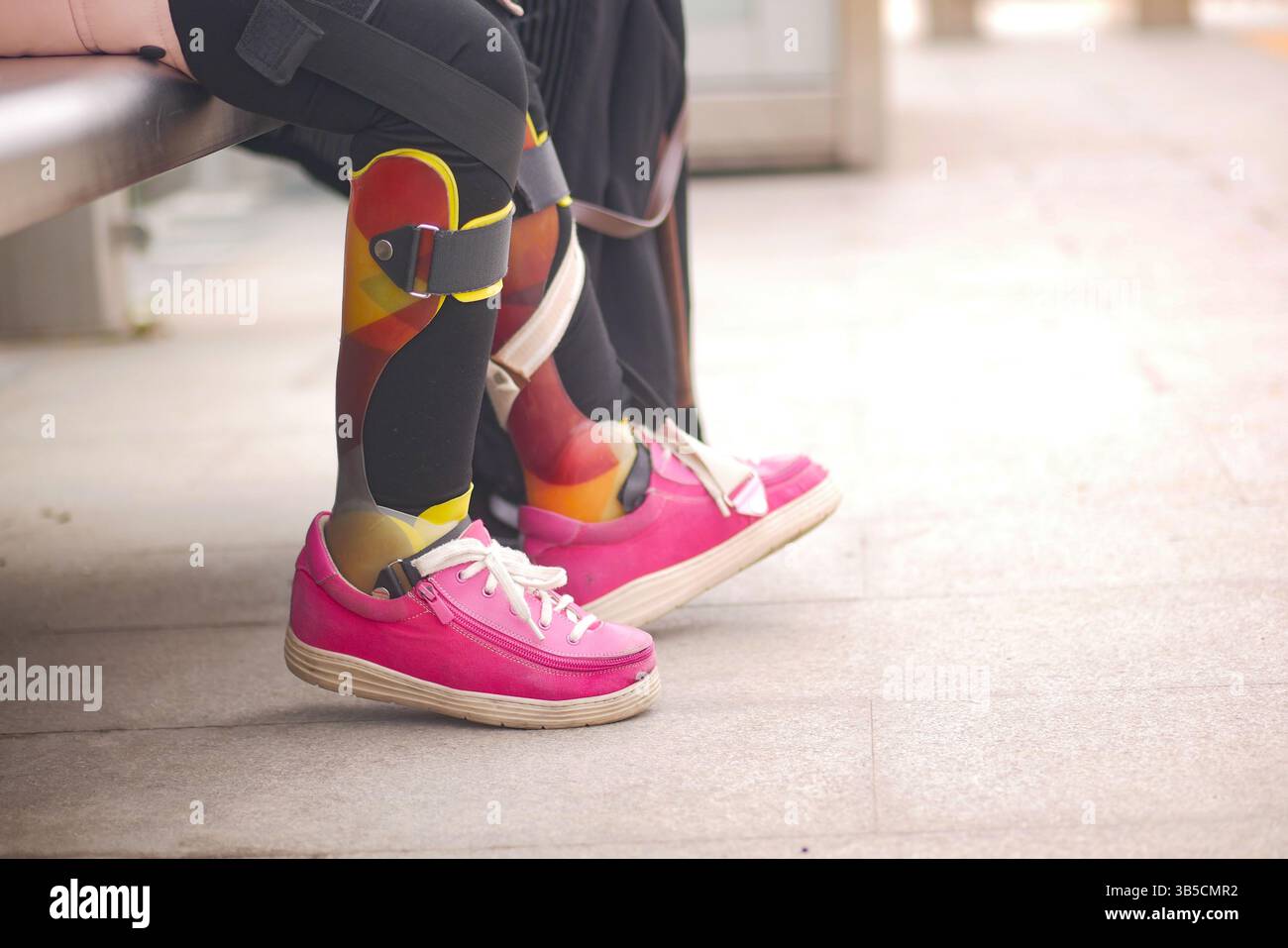 child with cerebral palsy leg orthosis outdoor Stock Photo - Alamy