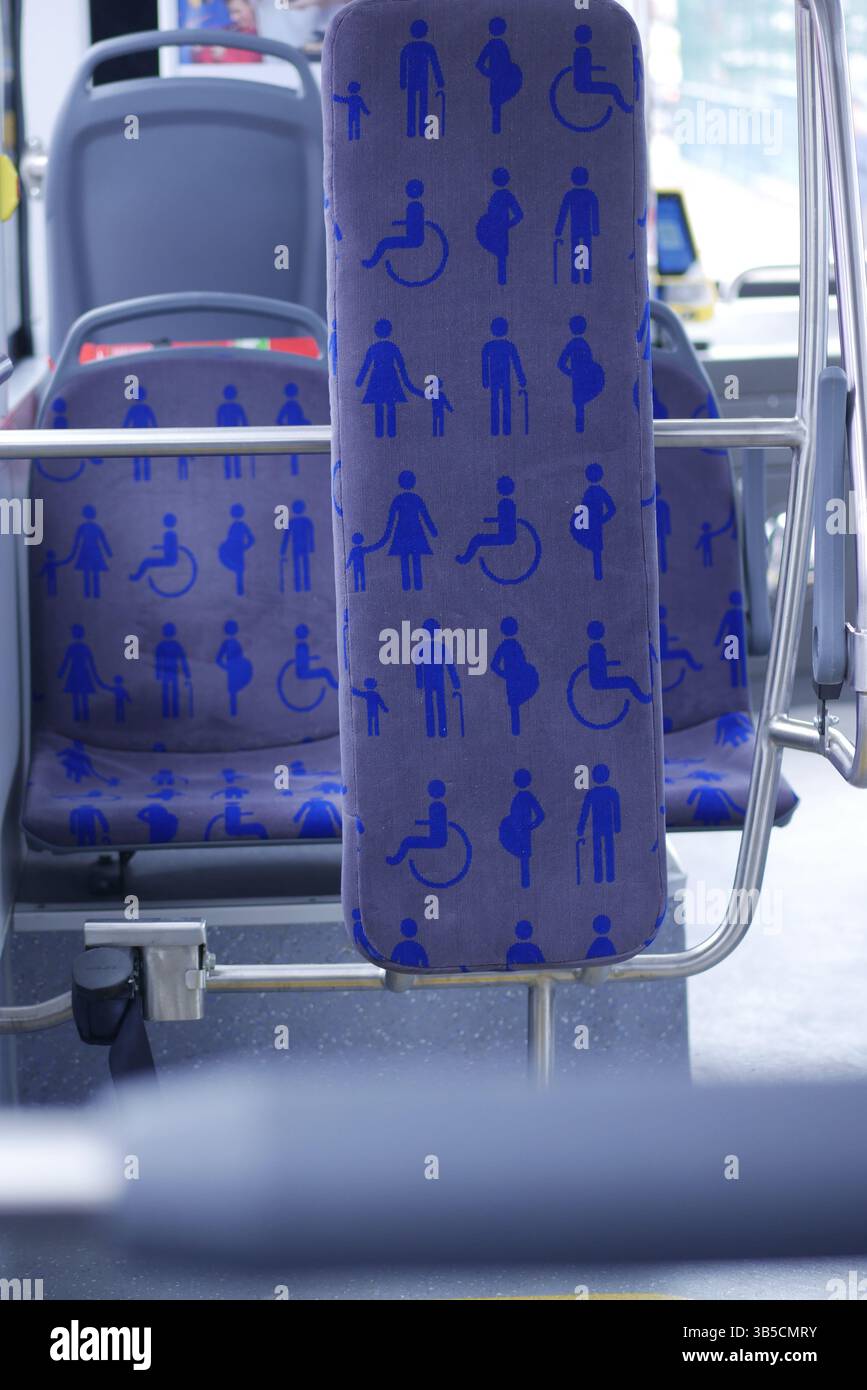 Unique bus seat design featuring accessible symbols for passengers ...