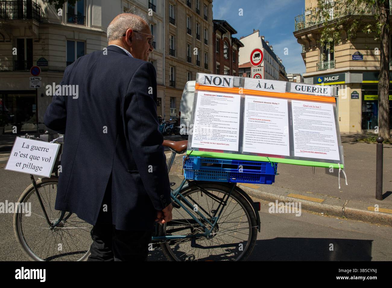 A protestor seen with bike during the demonstration. Thousands marched ...