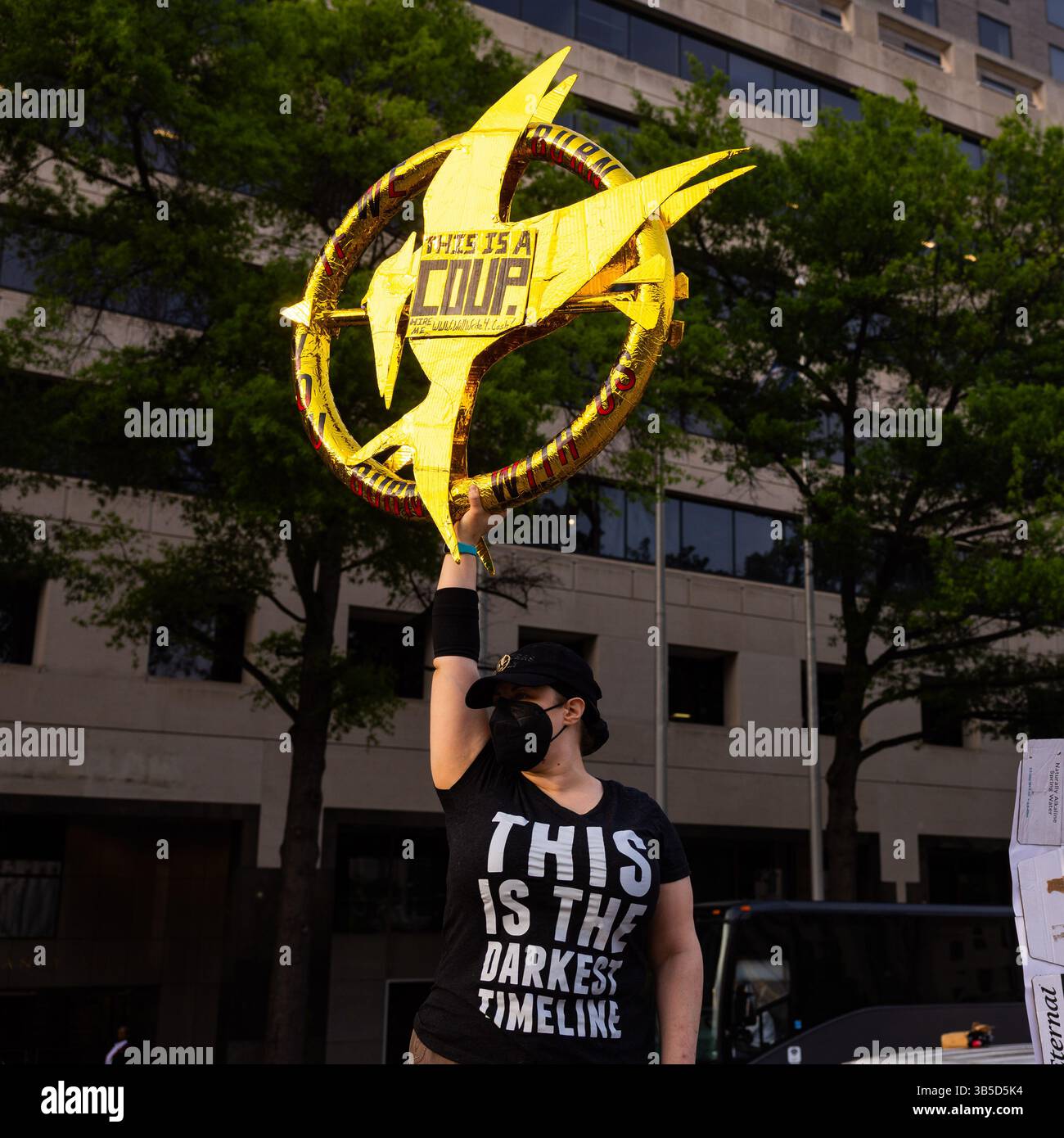 Washington, District Of Columbia, USA. 1st May, 2025. A protestor holds ...