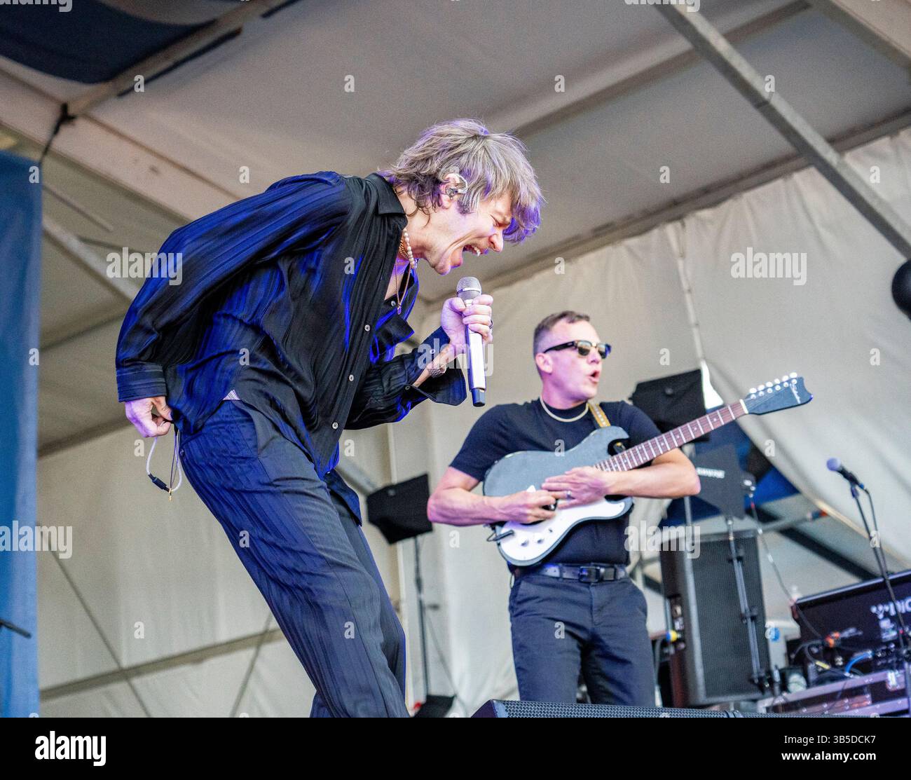 Matt Shultz, left and Brad Shultz of Cage The Elephant performs during ...