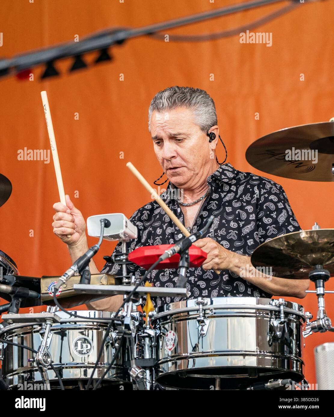 Karl Perazzo performs with Carlos Santana during the second weekend of ...