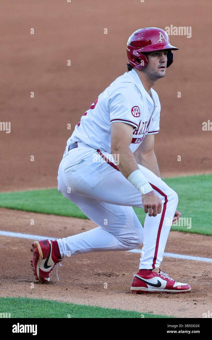 May 1, 2025: Hogs base runner Ryder Helfrick (27) works his way down ...