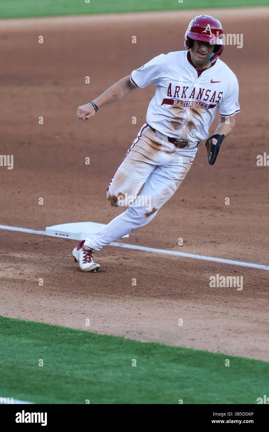 May 1, 2025: Razorback base runner Carson Boles (28) steps on the bag ...