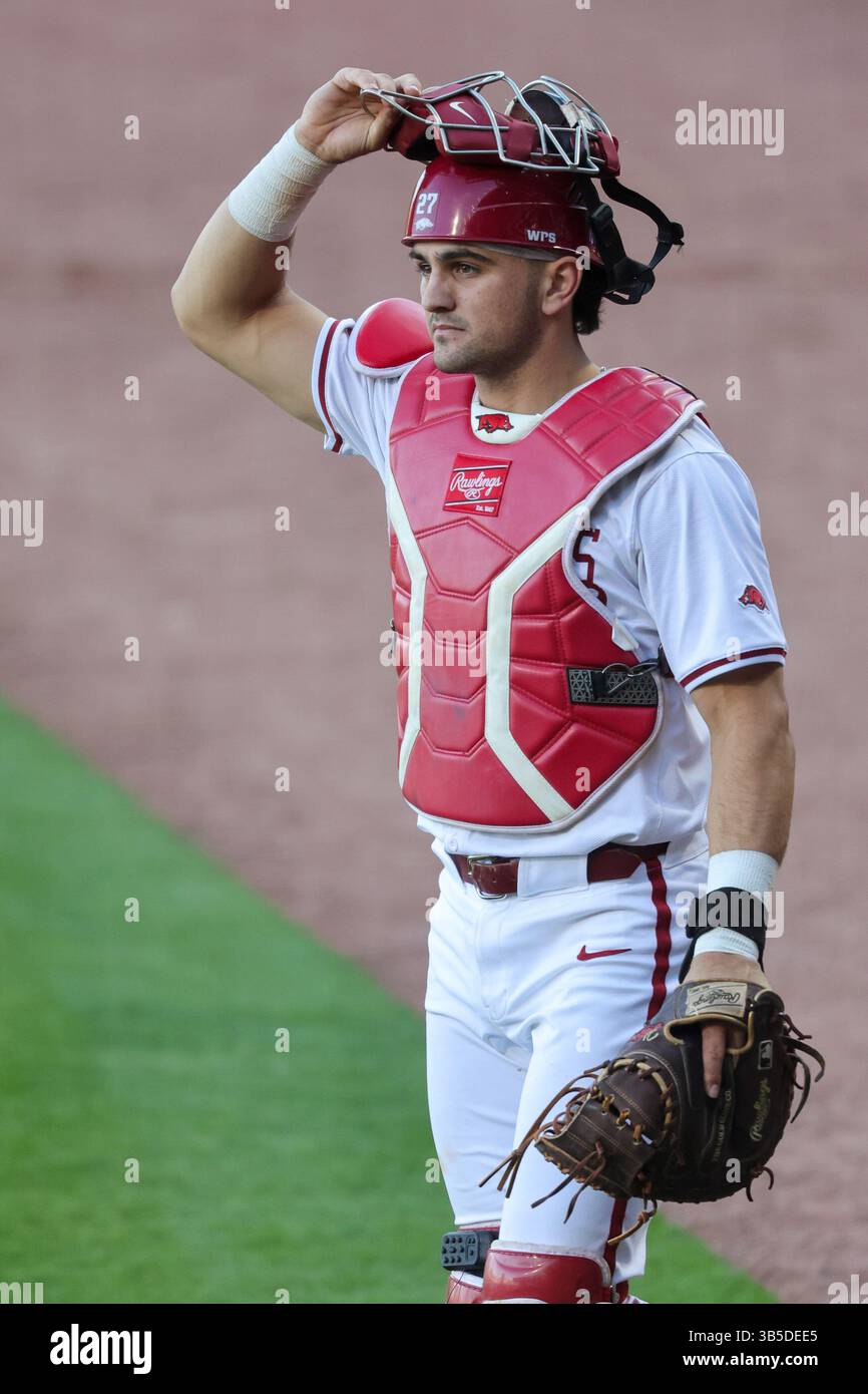 May 1, 2025: Hogs catcher Ryder Helfrick (27) adjust his face mask ...