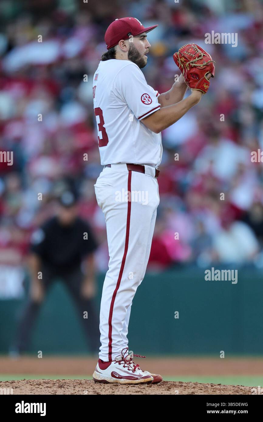 May 1, 2025: Hogs pitcher Zach Root (33) takes a deep breath before ...