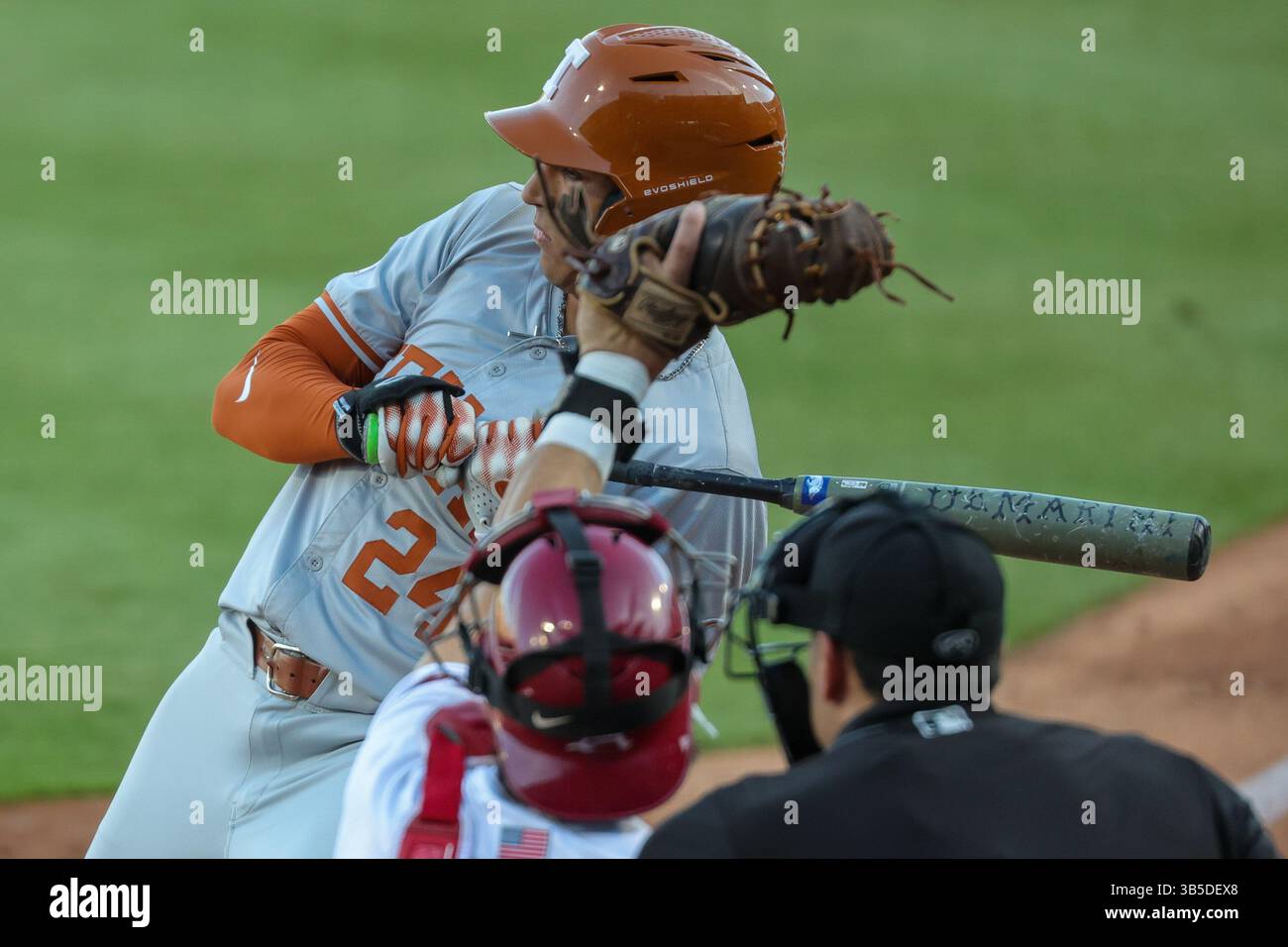May 1, 2025: Adrian Rodriguez (24) of Texas leans back out of the way ...