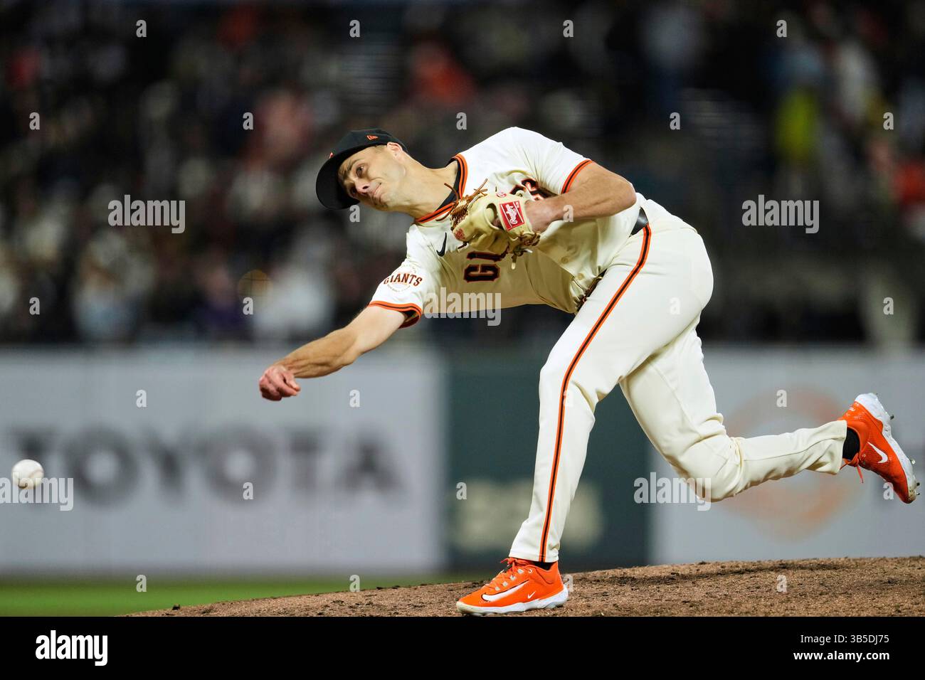 San Francisco Giants pitcher Tyler Rogers throws to a Colorado Rockies batter during the eighth ...