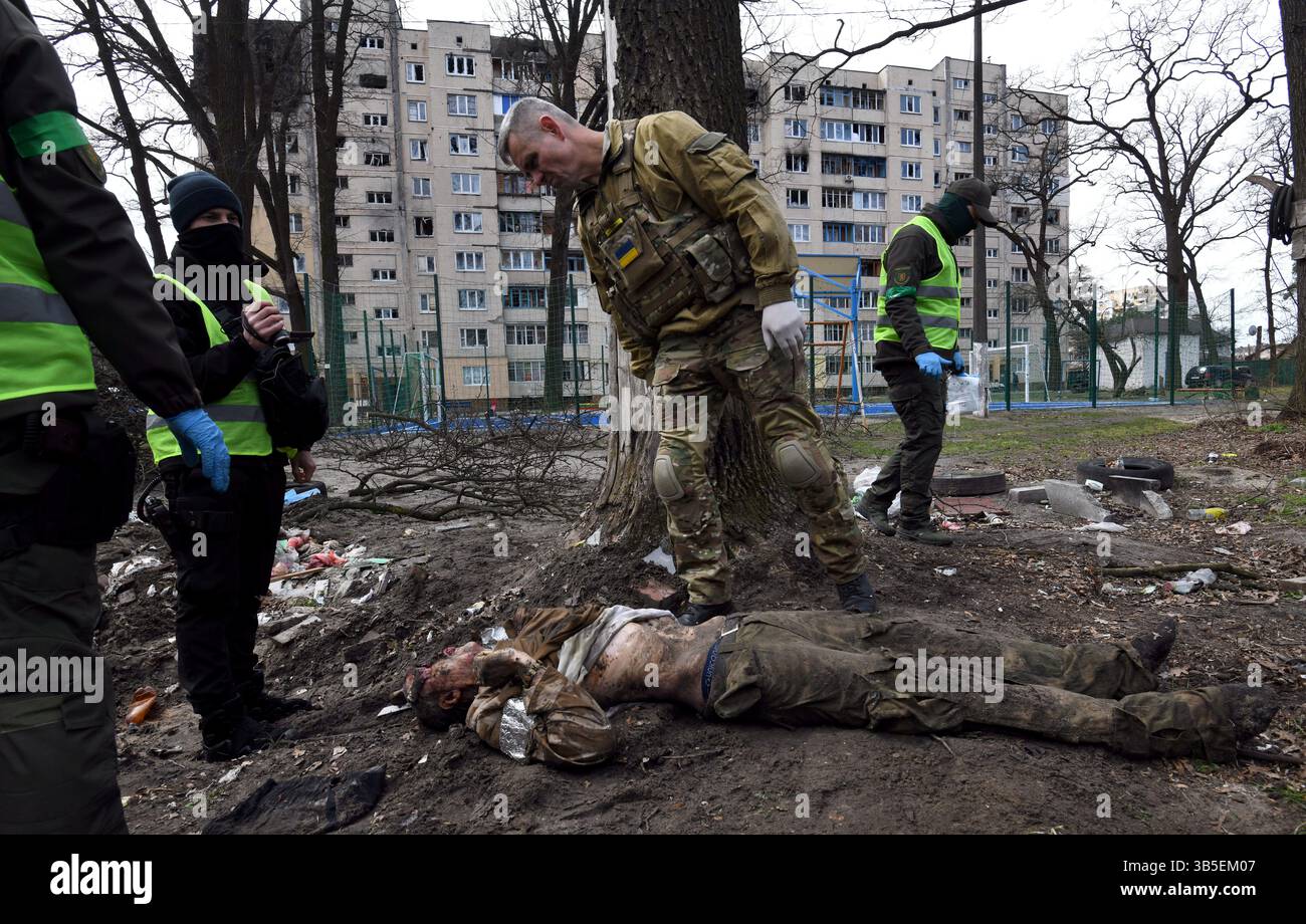 April 14, 2022, Bucha, Ukraine: Police work with local residents and ...
