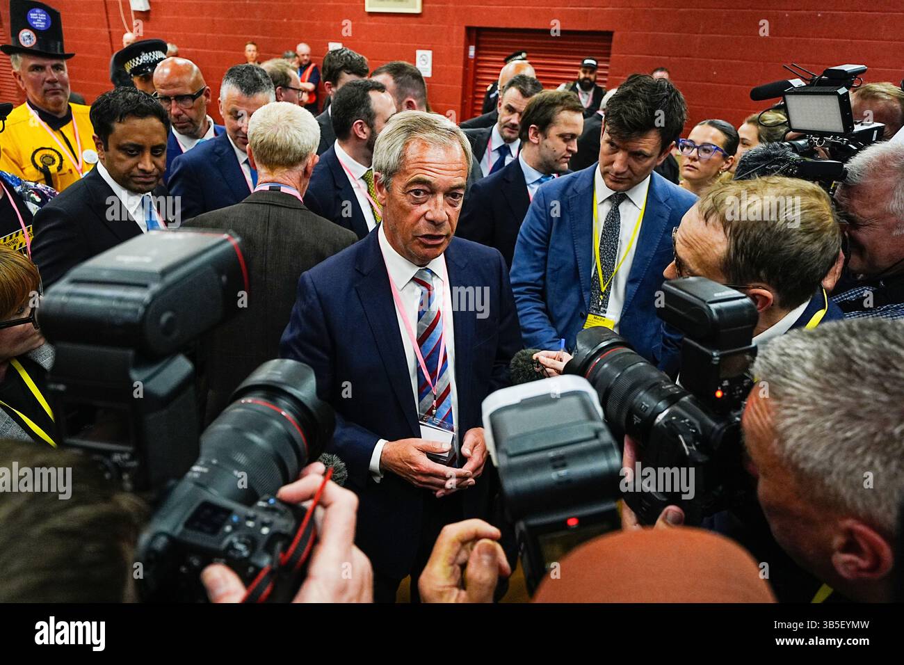 Reform UK party leader Nigel Farage talks to the media after Sarah ...