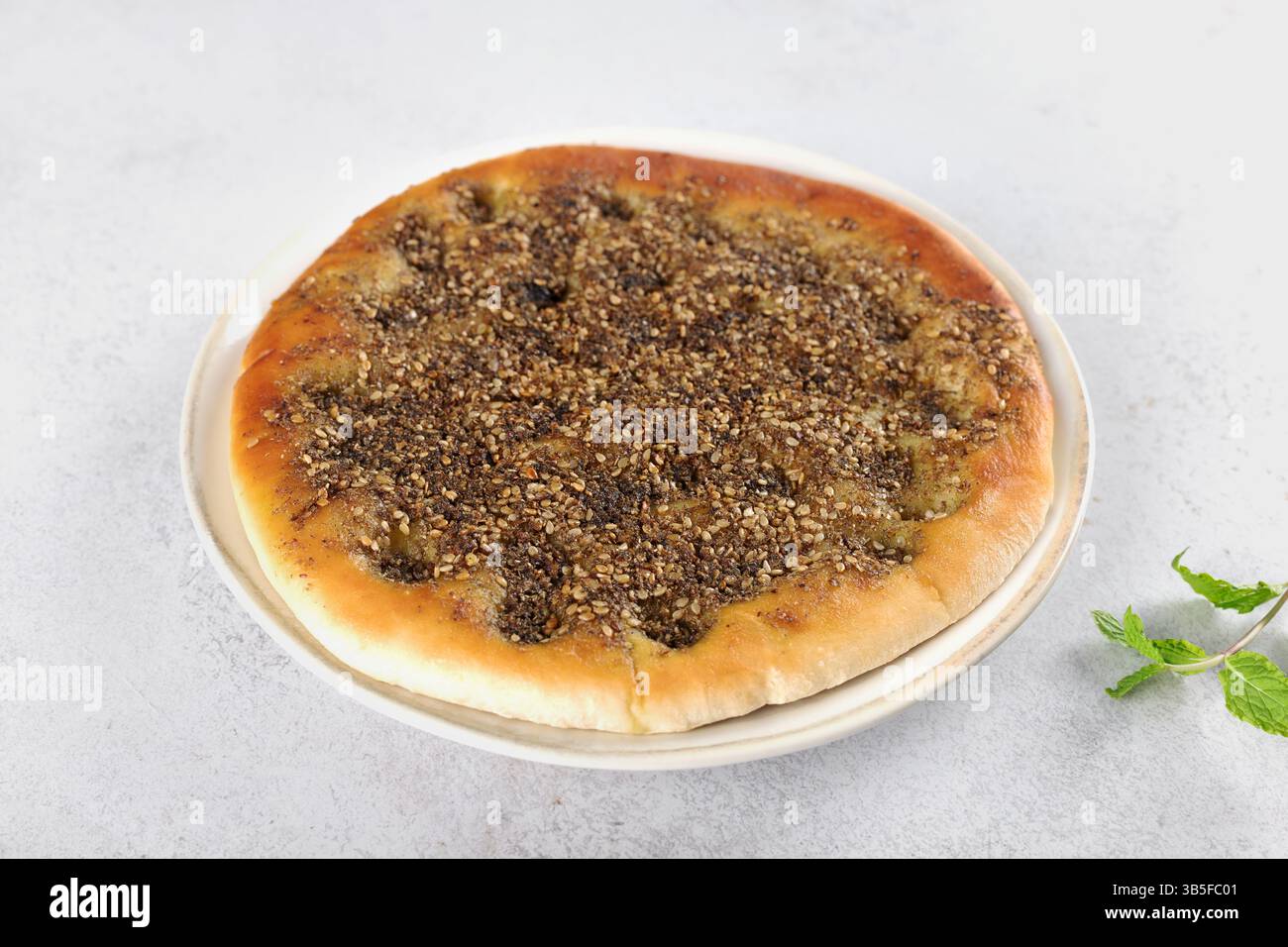 Traditional Middle Eastern flatbread zaatar manakish with olive oil and ...