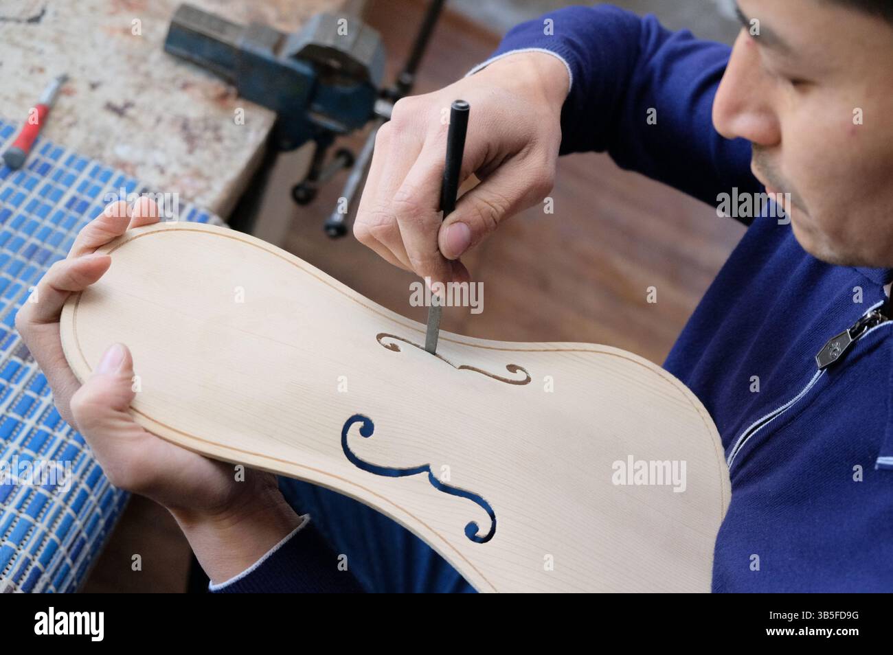 Production of various musical instruments in the workshop Stock Photo ...