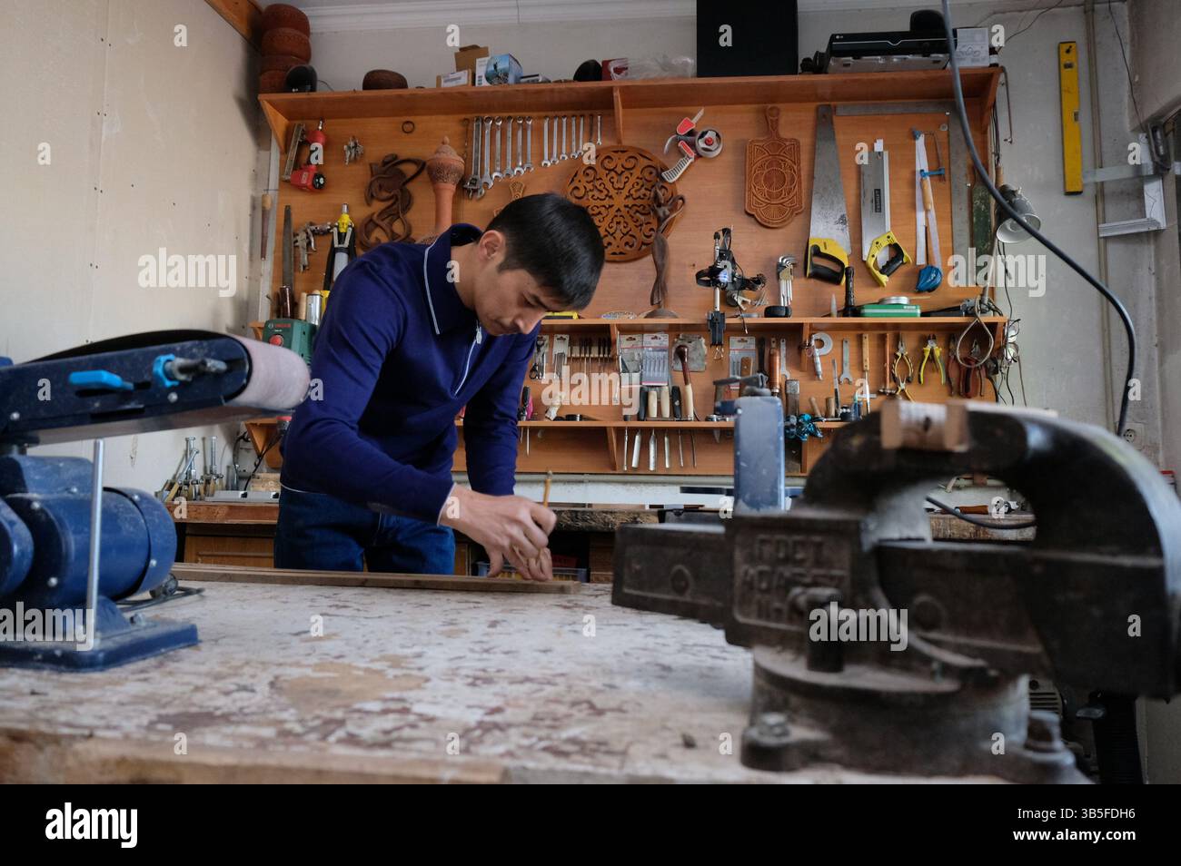 Production of various musical instruments in the workshop Stock Photo ...