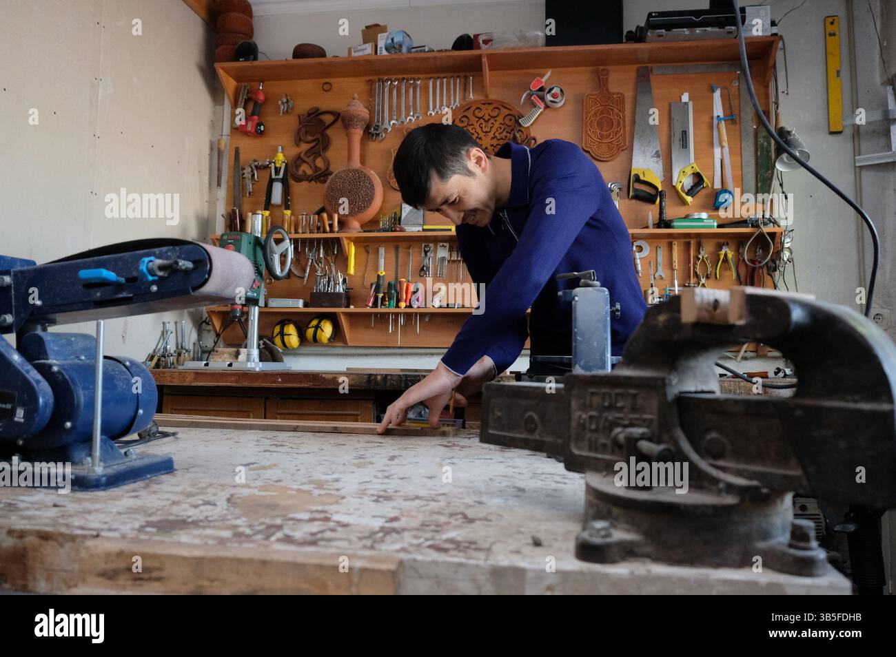 Production of various musical instruments in the workshop Stock Photo ...