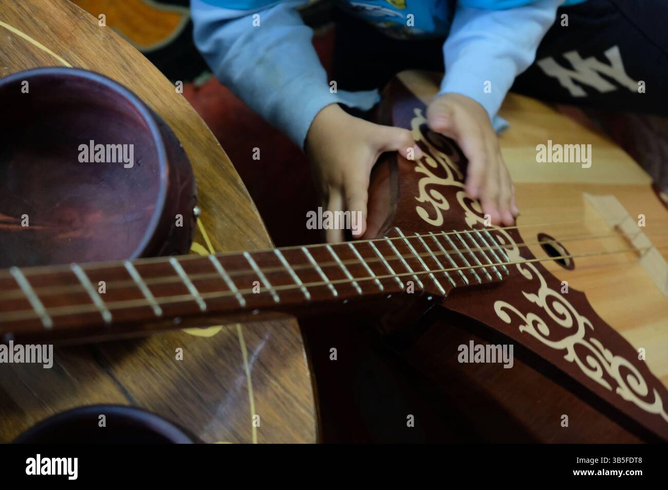 Production of various musical instruments in the workshop Stock Photo ...