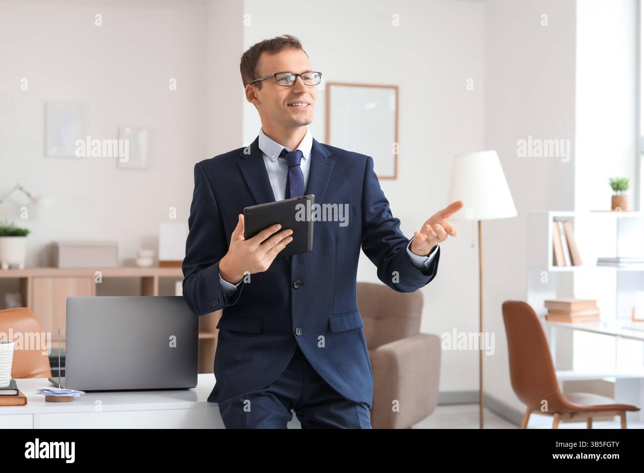 Male economist tablet computer hi-res stock photography and images - Alamy