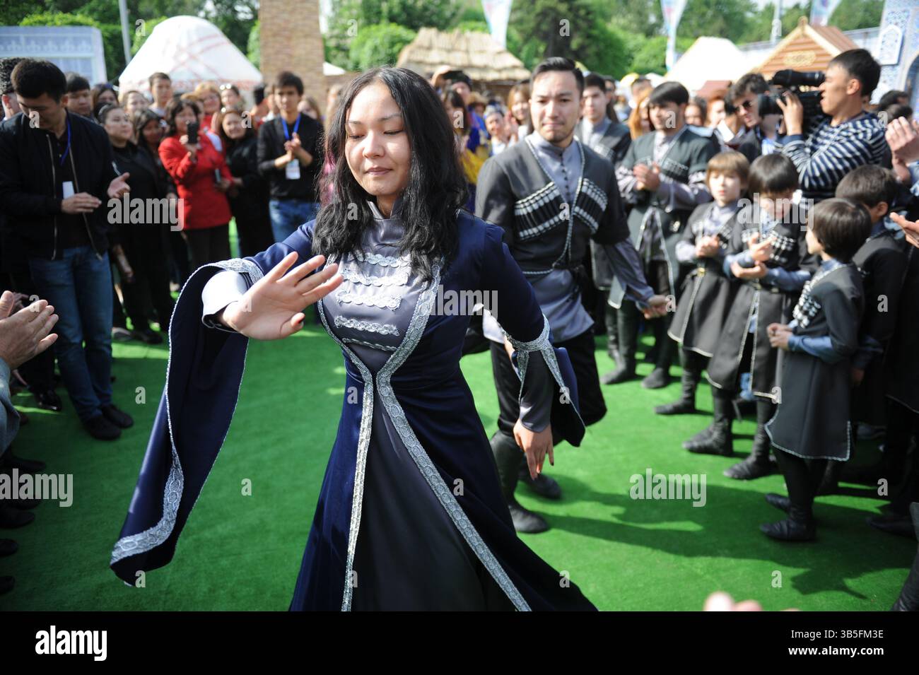 On May 1, people in different national costumes celebrate the Day of ...