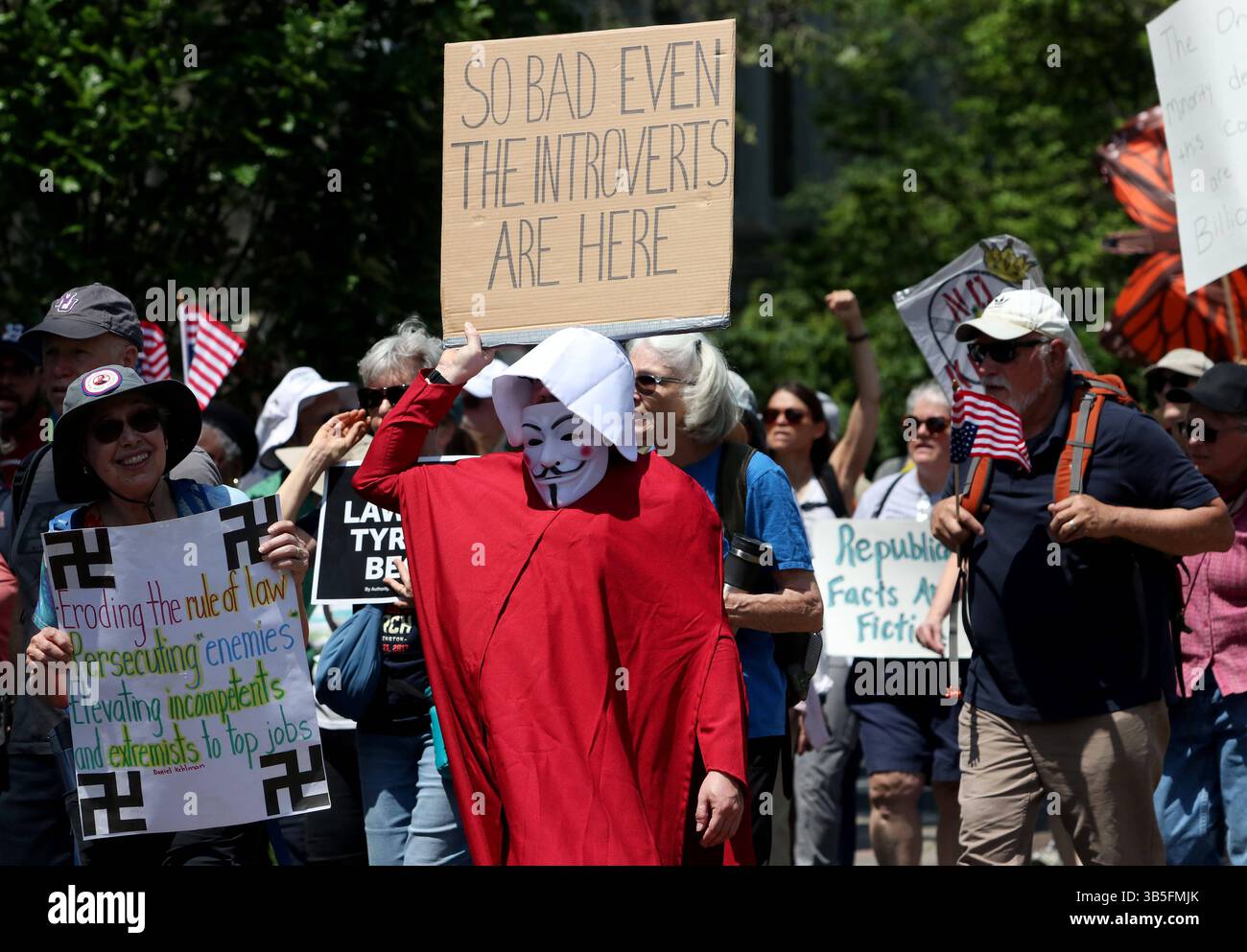 May Day Protest in Washington, USA Demonstrators hold signs as they ...