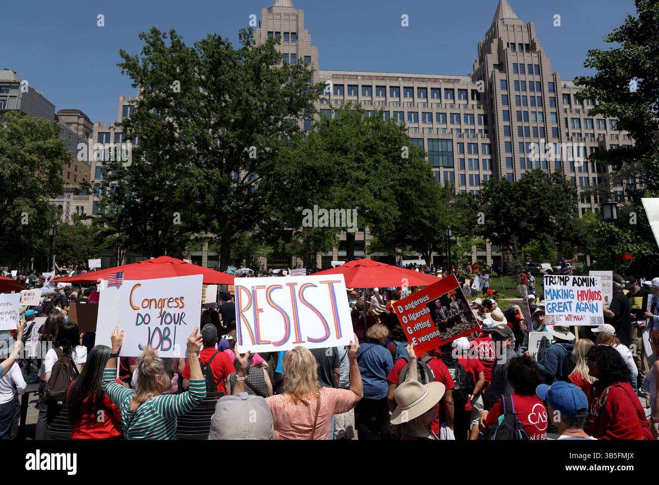 May Day Protest in Washington, USA Demonstrators hold signs as they ...