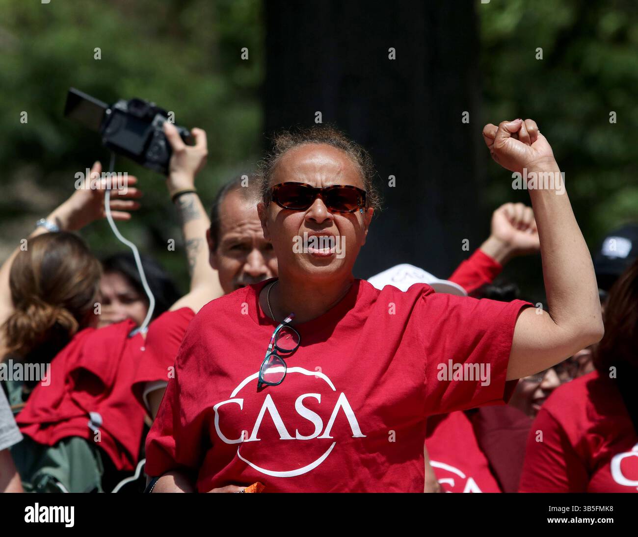 May Day Protest in Washington, USA Demonstrators hold signs as they ...