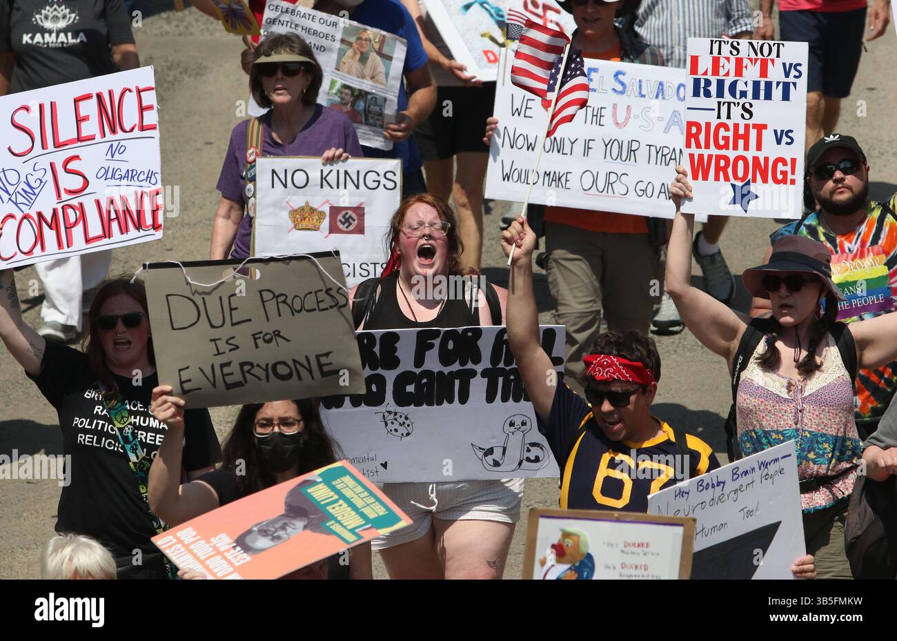 May Day Protest in Washington, USA Demonstrators hold signs as they ...