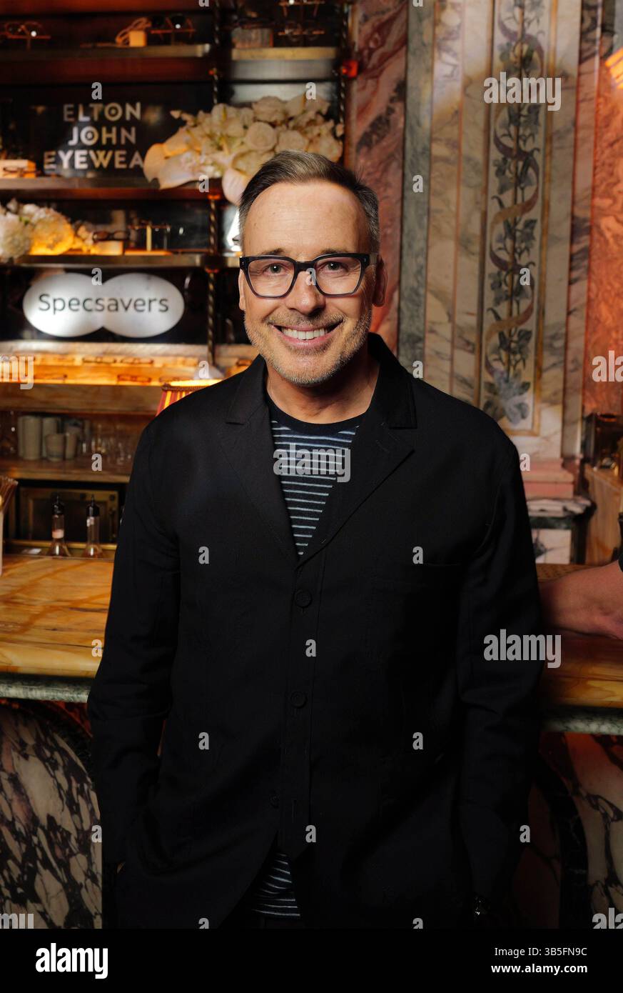 EDITORIAL USE ONLY David Furnish at the launch of a Specsavers ...