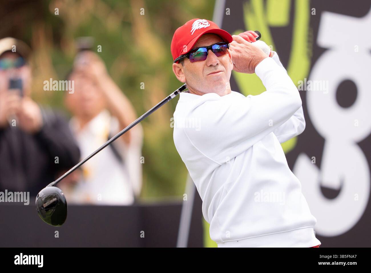 Captain Sergio Garcia of Fireballs GC hits his shot from the 11th tee ...