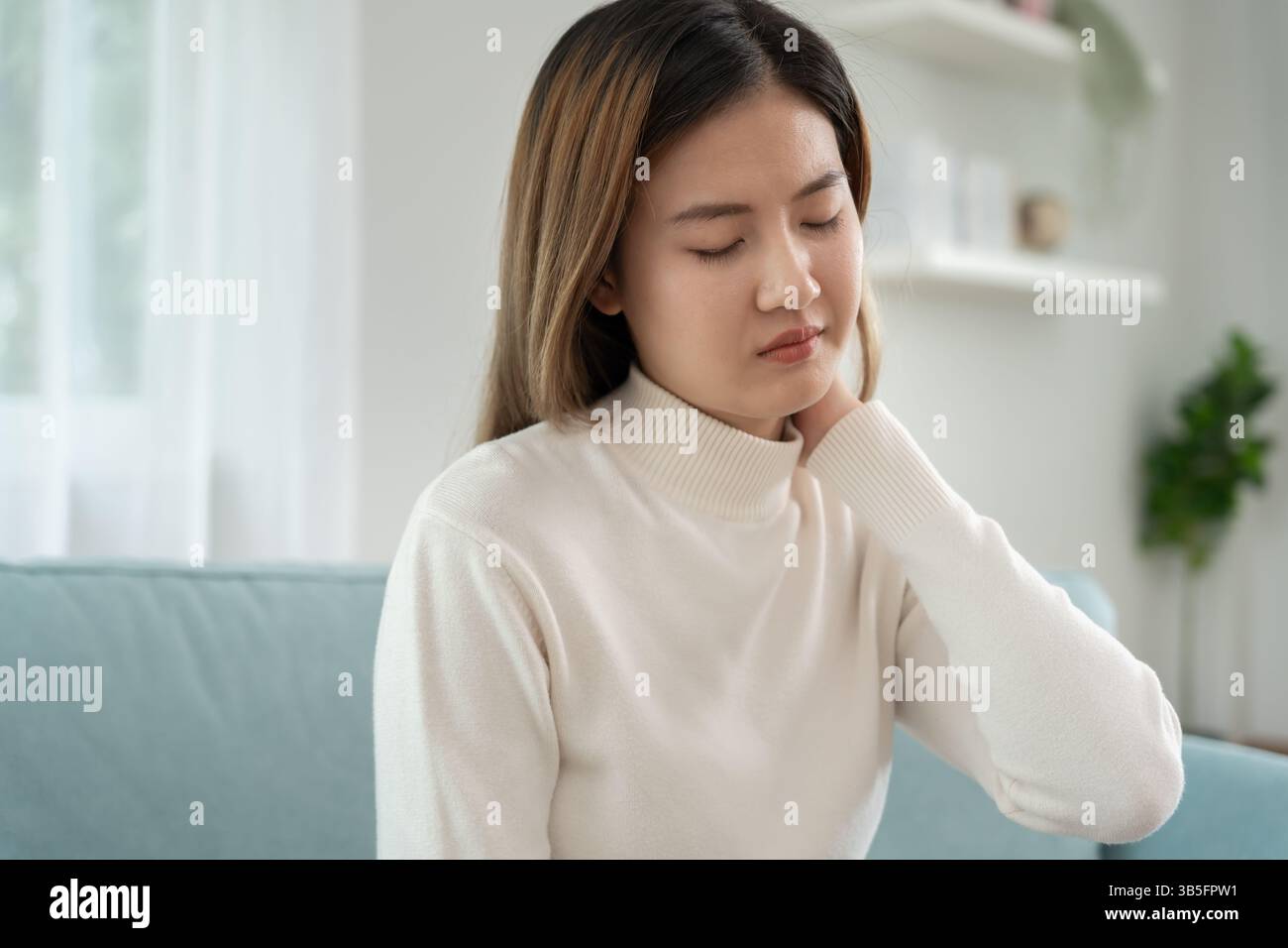 office syndromes, woman massaging neck pain due to work and using a ...