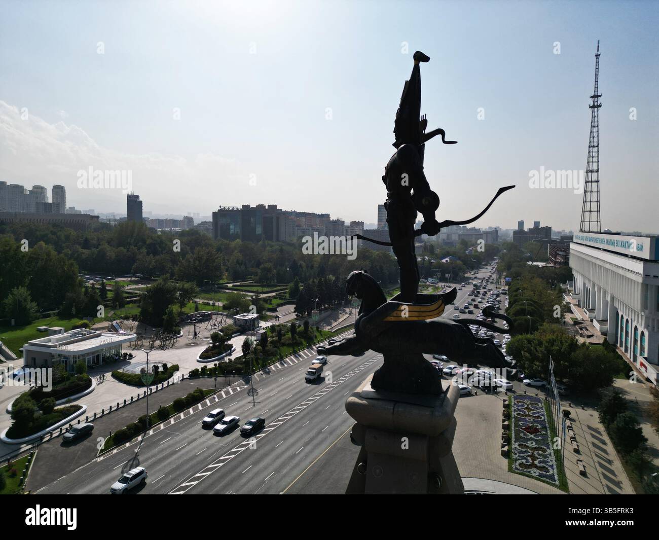 The central square and the monument with the Golden Man Stock Photo - Alamy