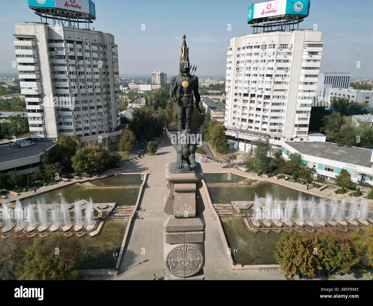 The central square and the monument with the Golden Man Stock Photo - Alamy