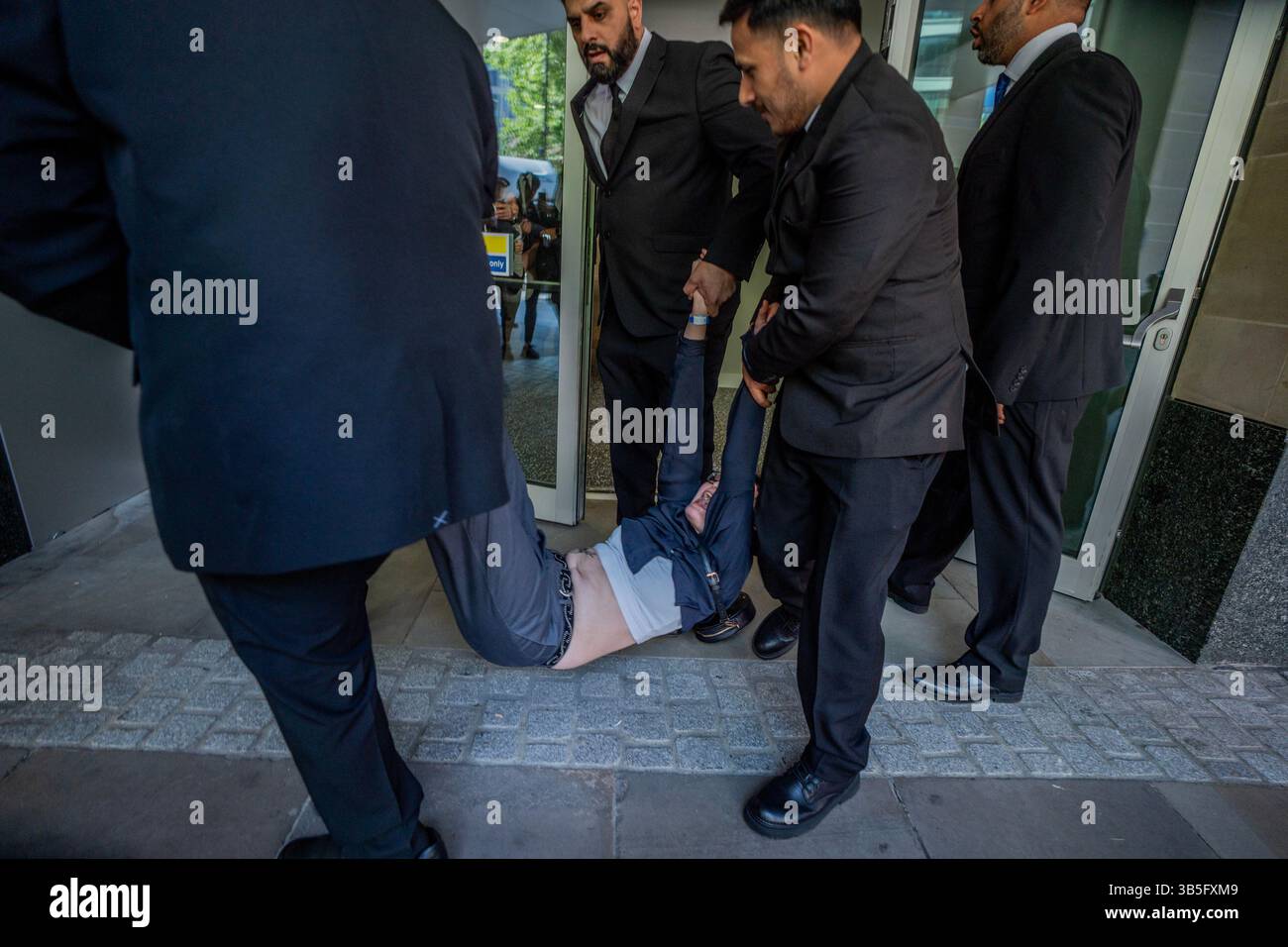 London, UK. 1st May, 2024. A climate change activist from ''AXE DRAX ...