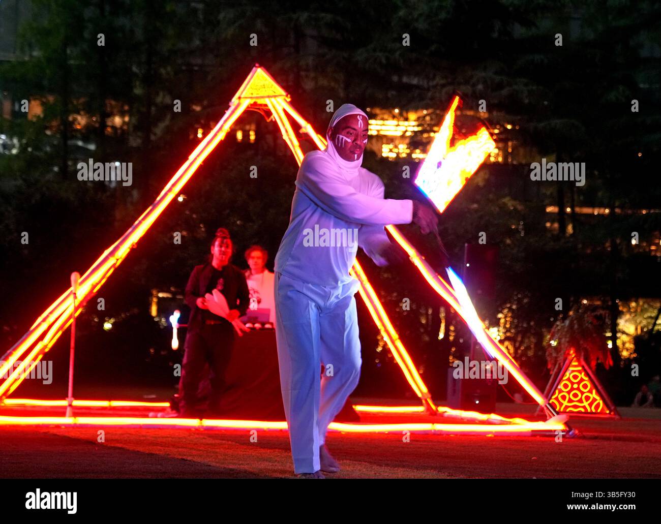 Beijing, China. 1st May, 2025. A light show is staged at Jing'an Park ...