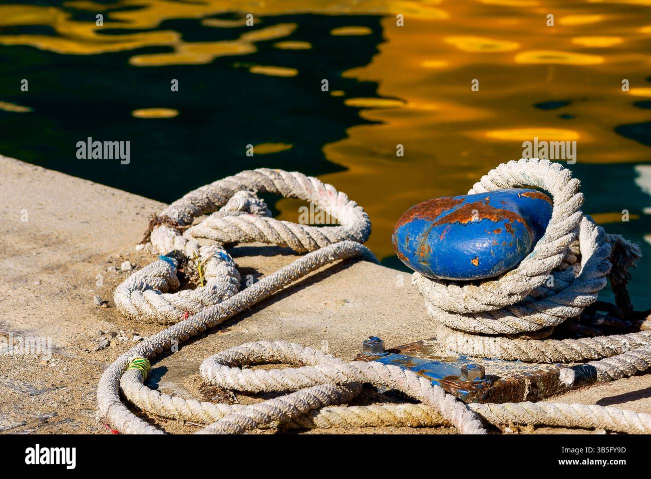 worn mooring rope of a boat, Puerto de Cala Ratjada. Llevant.Mallorca ...