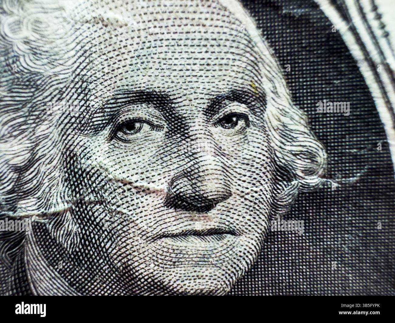 George Washington's disgruntled face in close-up macro on dollar bill ...
